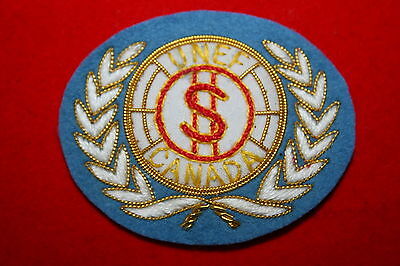 UNITED NATIONS UN BULLION WIRE BREAST BADGE CANADIAN CANADA PAYMASTER ...